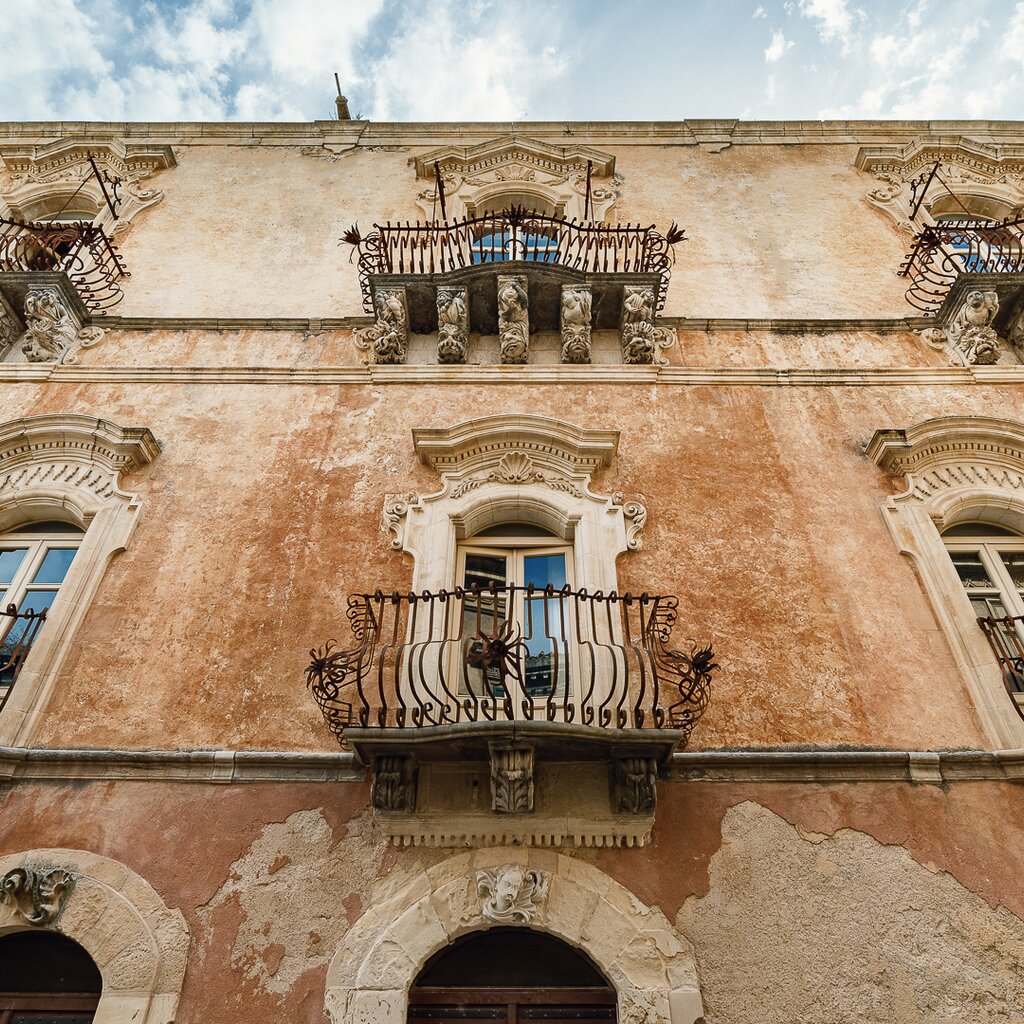 Services - Palazzo Cosentini and its baroque masks